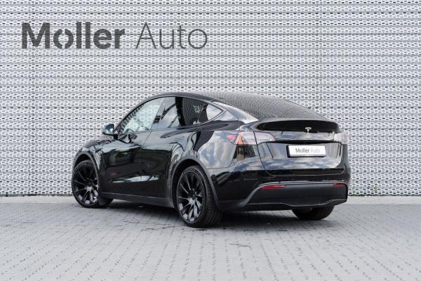 Black Tesla Model Y 2022 in Marupe, with an engine capacity of 0.00 L and mileage of 88 thousand km for 39750 €, photo 3 on AUTOMOTO.COM.LV