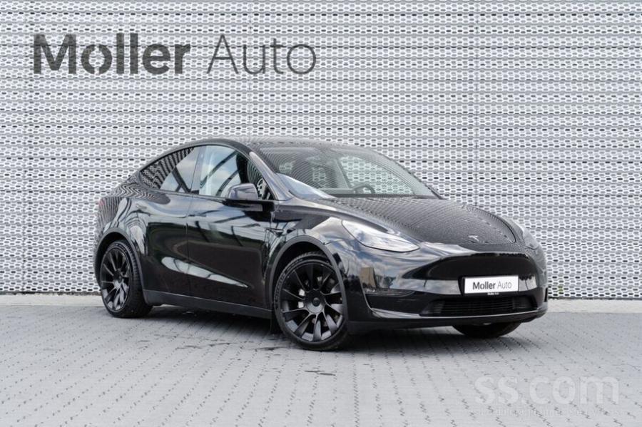 Black Tesla Model Y 2022 in Riga, with an engine capacity of 0.00 L and mileage of 88 thousand km for 39750 €, photo 3 on AUTOMOTO.COM.LV
