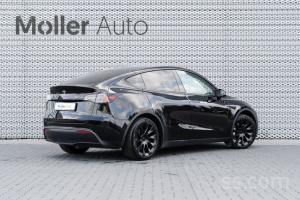 Black Tesla Model Y 2022 in Riga, with an engine capacity of 0.00 L and mileage of 88 thousand km for 39750 €, photo 5 on AUTOMOTO.COM.LV