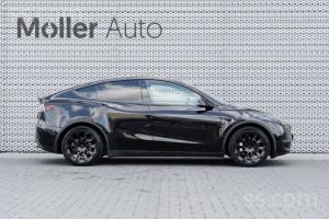 Black Tesla Model Y 2022 in Riga, with an engine capacity of 0.00 L and mileage of 88 thousand km for 39750 €, photo 6 on AUTOMOTO.COM.LV