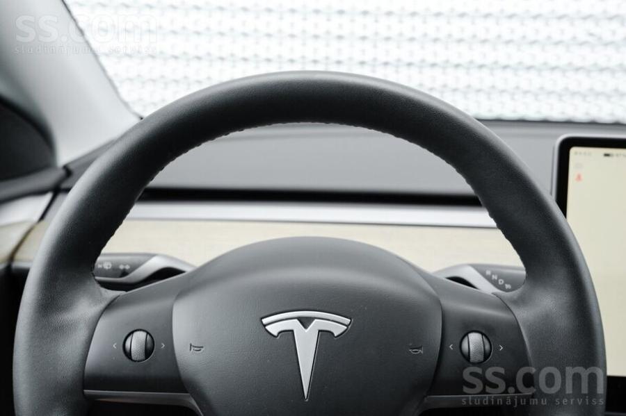 Black Tesla Model Y 2022 in Riga, with an engine capacity of 0.00 L and mileage of 88 thousand km for 39750 €, photo 11 on AUTOMOTO.COM.LV