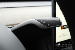 Black Tesla Model Y 2022 in Riga, with an engine capacity of 0.00 L and mileage of 88 thousand km for 39750 €, photo 12 on AUTOMOTO.COM.LV