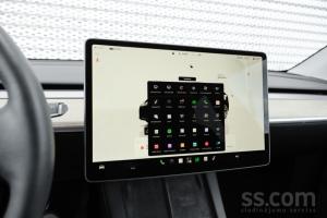 Black Tesla Model Y 2022 in Riga, with an engine capacity of 0.00 L and mileage of 88 thousand km for 39750 €, photo 13 on AUTOMOTO.COM.LV