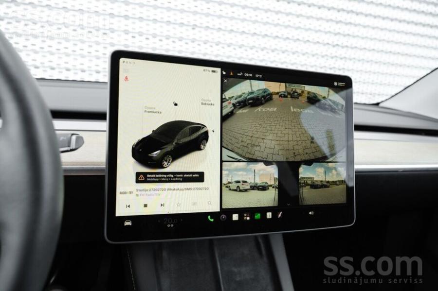 Black Tesla Model Y 2022 in Riga, with an engine capacity of 0.00 L and mileage of 88 thousand km for 39750 €, photo 16 on AUTOMOTO.COM.LV