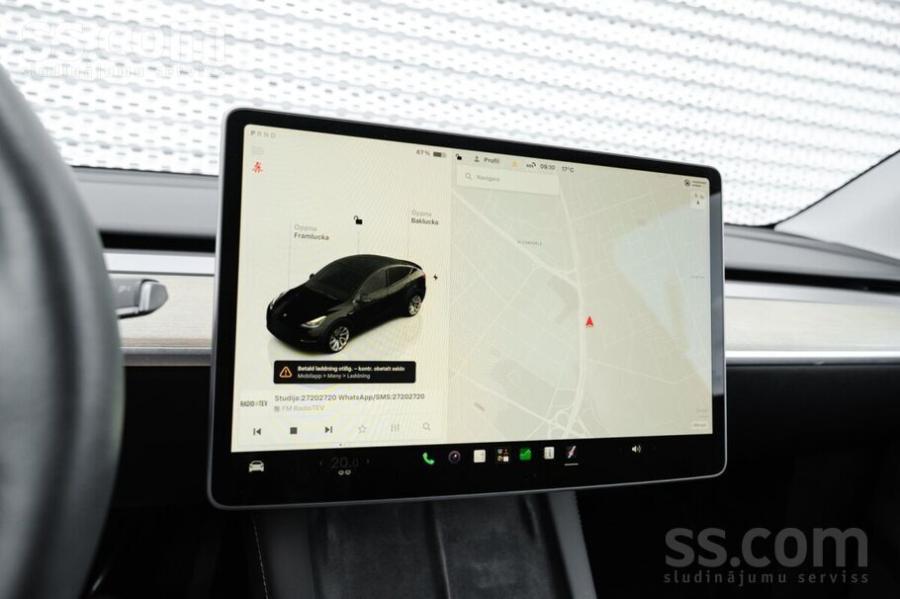 Black Tesla Model Y 2022 in Riga, with an engine capacity of 0.00 L and mileage of 88 thousand km for 39750 €, photo 17 on AUTOMOTO.COM.LV