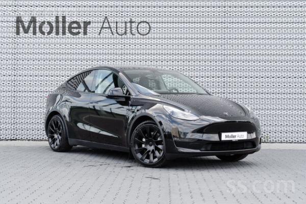 Black Tesla Model Y 2022 in Riga, with an engine capacity of 0.00 L and mileage of 88 thousand km for 39750 €, photo 2 on AUTOMOTO.COM.LV