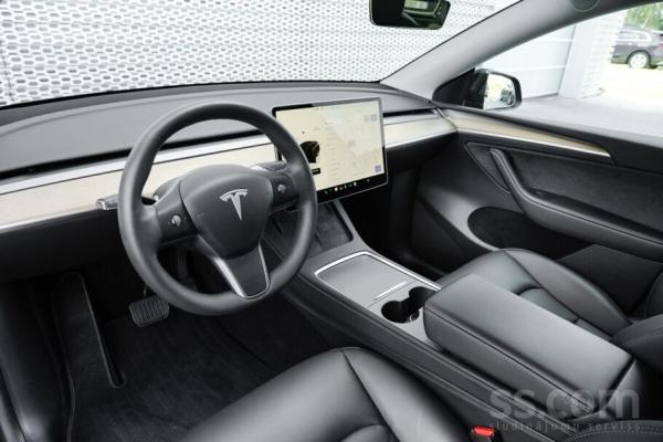 Black Tesla Model Y 2022 in Riga, with an engine capacity of 0.00 L and mileage of 88 thousand km for 39750 €, photo 9 on AUTOMOTO.COM.LV