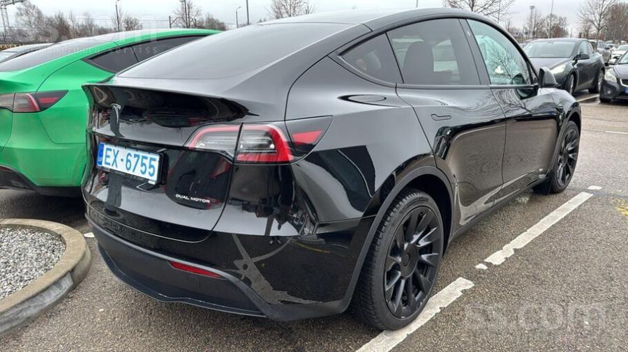 Black Tesla Model Y 2022 in Riga, with an engine capacity of 0.00 L and mileage of 50 thousand km for 33000 €, photo 3 on AUTOMOTO.COM.LV