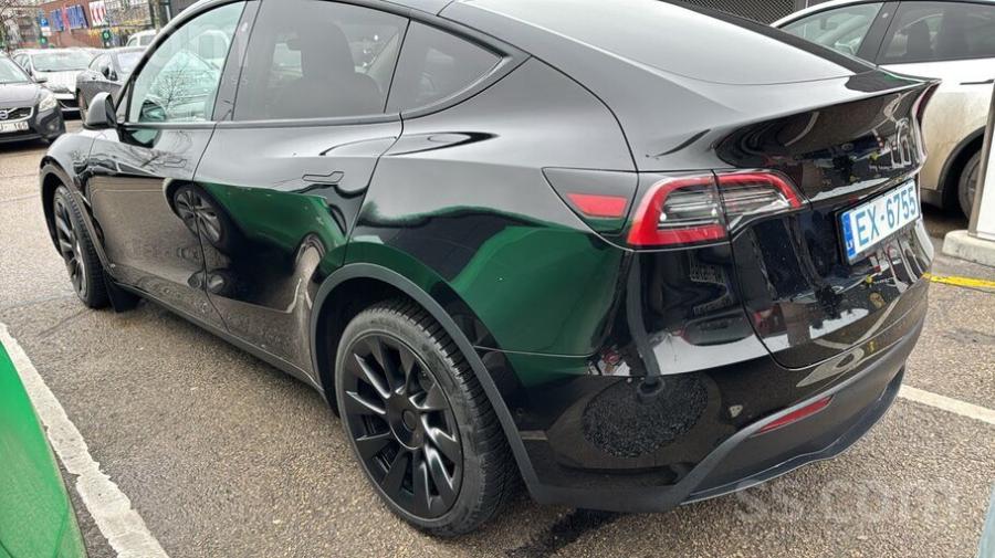 Black Tesla Model Y 2022 in Riga, with an engine capacity of 0.00 L and mileage of 50 thousand km for 33000 €, photo 5 on AUTOMOTO.COM.LV