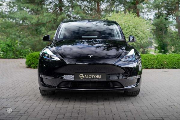 Black Tesla Model Y 2022 in Kaunas, with an engine capacity of 0.00 L and mileage of 77 thousand km for 34200 €, photo 2 on AUTOMOTO.COM.LV