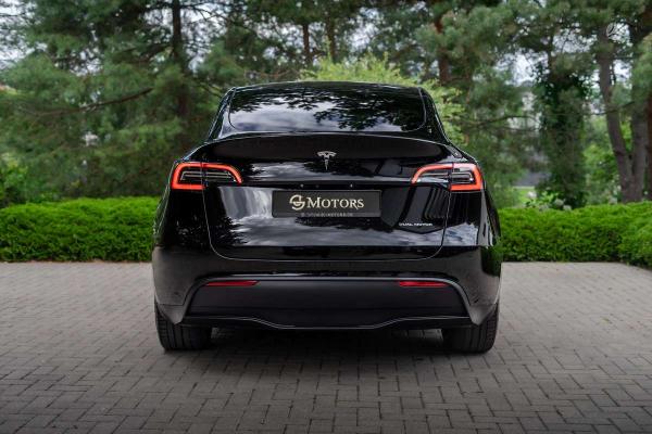 Black Tesla Model Y 2022 in Kaunas, with an engine capacity of 0.00 L and mileage of 77 thousand km for 34200 €, photo 9 on AUTOMOTO.COM.LV