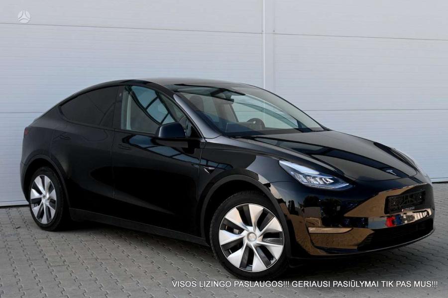 Black Tesla Model Y 2022 in Kretinga, with an engine capacity of 0.00 L and mileage of 70 thousand km for 28699 €, photo 1 on AUTOMOTO.COM.LV