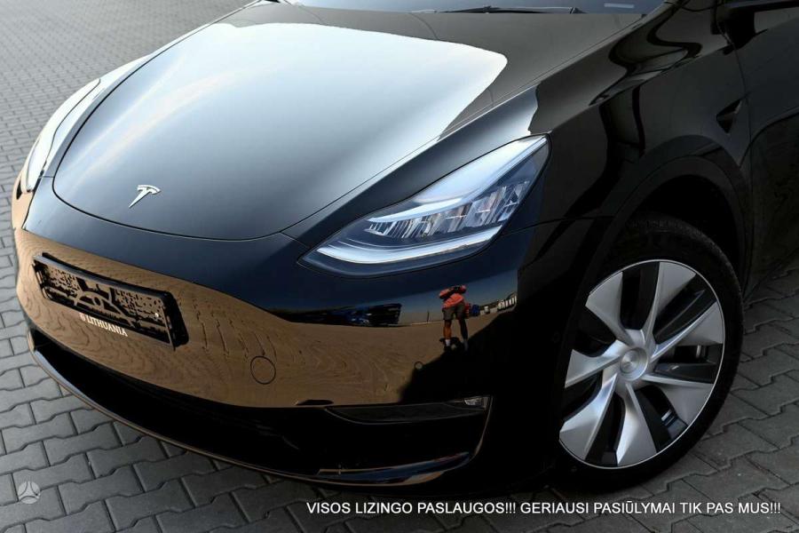 Black Tesla Model Y 2022 in Kretinga, with an engine capacity of 0.00 L and mileage of 70 thousand km for 28699 €, photo 5 on AUTOMOTO.COM.LV