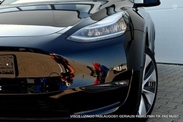 Black Tesla Model Y 2022 in Kretinga, with an engine capacity of 0.00 L and mileage of 70 thousand km for 28699 €, photo 5 on AUTOMOTO.COM.LV