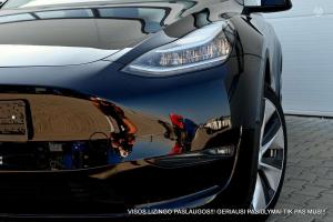 Black Tesla Model Y 2022 in Kretinga, with an engine capacity of 0.00 L and mileage of 70 thousand km for 28699 €, photo 6 on AUTOMOTO.COM.LV