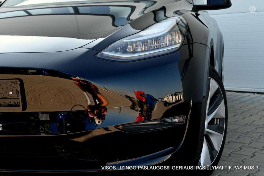 Black Tesla Model Y 2022 in Kretinga, with an engine capacity of 0.00 L and mileage of 70 thousand km for 28699 €, photo 6 on AUTOMOTO.COM.LV