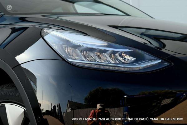 Black Tesla Model Y 2022 in Kretinga, with an engine capacity of 0.00 L and mileage of 70 thousand km for 28699 €, photo 7 on AUTOMOTO.COM.LV