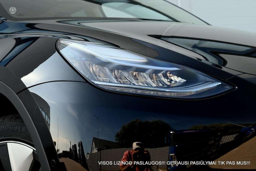 Black Tesla Model Y 2022 in Kretinga, with an engine capacity of 0.00 L and mileage of 70 thousand km for 28699 €, photo 8 on AUTOMOTO.COM.LV