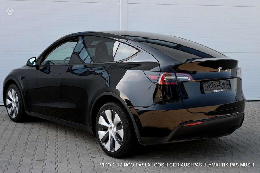Black Tesla Model Y 2022 in Kretinga, with an engine capacity of 0.00 L and mileage of 70 thousand km for 28699 €, photo 13 on AUTOMOTO.COM.LV