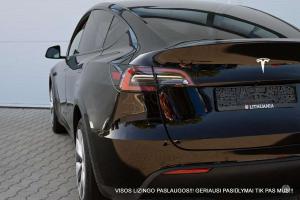 Black Tesla Model Y 2022 in Kretinga, with an engine capacity of 0.00 L and mileage of 70 thousand km for 28699 €, photo 14 on AUTOMOTO.COM.LV