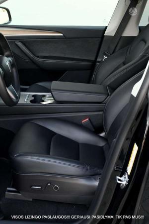 Black Tesla Model Y 2022 in Kretinga, with an engine capacity of 0.00 L and mileage of 70 thousand km for 28699 €, photo 20 on AUTOMOTO.COM.LV