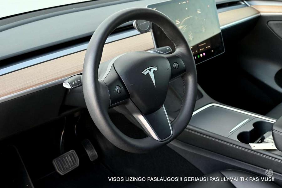Black Tesla Model Y 2022 in Kretinga, with an engine capacity of 0.00 L and mileage of 70 thousand km for 28699 €, photo 23 on AUTOMOTO.COM.LV