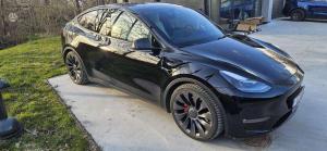 Black Tesla Model Y 2022 in Gargzdai, with an engine capacity of 0.00 L and mileage of 45 thousand km for 31500 €, photo  on AUTOMOTO.COM.LV