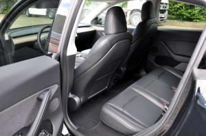 Black Tesla Model Y 2022 in Vilnius, with an engine capacity of 0.00 L and mileage of 126 thousand km for 30900 €, photo 9 on AUTOMOTO.COM.LV
