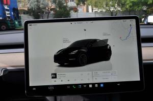 Black Tesla Model Y 2022 in Vilnius, with an engine capacity of 0.00 L and mileage of 126 thousand km for 30900 €, photo 11 on AUTOMOTO.COM.LV