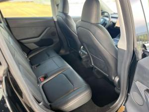 Black Tesla Model Y 2022 in Vilnius, with an engine capacity of 0.00 L and mileage of 115 thousand km for 32999 €, photo 13 on AUTOMOTO.COM.LV