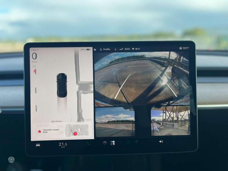 Black Tesla Model Y 2022 in Vilnius, with an engine capacity of 0.00 L and mileage of 115 thousand km for 32999 €, photo 19 on AUTOMOTO.COM.LV