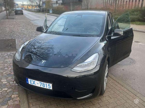Black Tesla Model Y 2022 in Riga, with an engine capacity of 0.00 L and mileage of 121 thousand km for 30000 €, photo 10 on AUTOMOTO.COM.LV