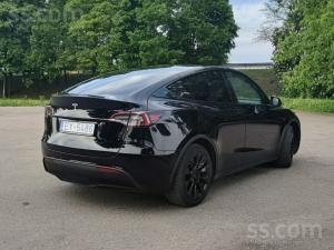 Melns Tesla Model Y 2023 Rīga, ar dzinēja tilpumu 0.00 L un nobraukumu 100 tūkst. km par 28000 €, foto 4 vietnē AUTOMOTO.COM.LV