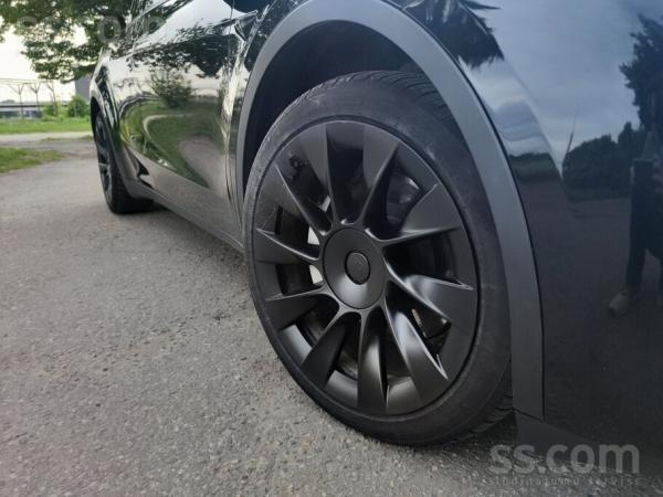 Melns Tesla Model Y 2023 Rīga, ar dzinēja tilpumu 0.00 L un nobraukumu 100 tūkst. km par 28000 €, foto 5 vietnē AUTOMOTO.COM.LV