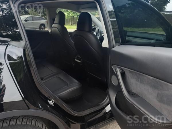 Melns Tesla Model Y 2023 Rīga, ar dzinēja tilpumu 0.00 L un nobraukumu 100 tūkst. km par 28000 €, foto 8 vietnē AUTOMOTO.COM.LV