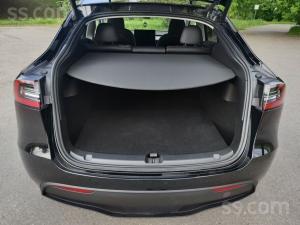Melns Tesla Model Y 2023 Rīga, ar dzinēja tilpumu 0.00 L un nobraukumu 100 tūkst. km par 28000 €, foto 10 vietnē AUTOMOTO.COM.LV