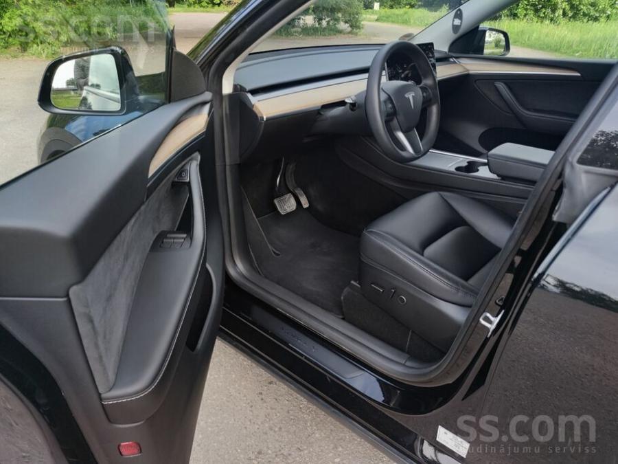 Melns Tesla Model Y 2023 Rīga, ar dzinēja tilpumu 0.00 L un nobraukumu 100 tūkst. km par 28000 €, foto 13 vietnē AUTOMOTO.COM.LV
