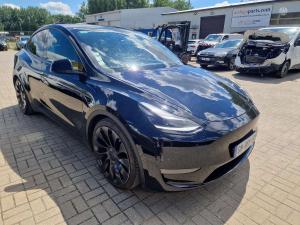 Black Tesla Model Y 2023 in Kaunas, with an engine capacity of 0.00 L and mileage of 305 thousand km for 21000 €, photo  on AUTOMOTO.COM.LV