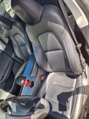 Black Tesla Model Y 2023 in Kaunas, with an engine capacity of 0.00 L and mileage of 305 thousand km for 21000 €, photo 5 on AUTOMOTO.COM.LV
