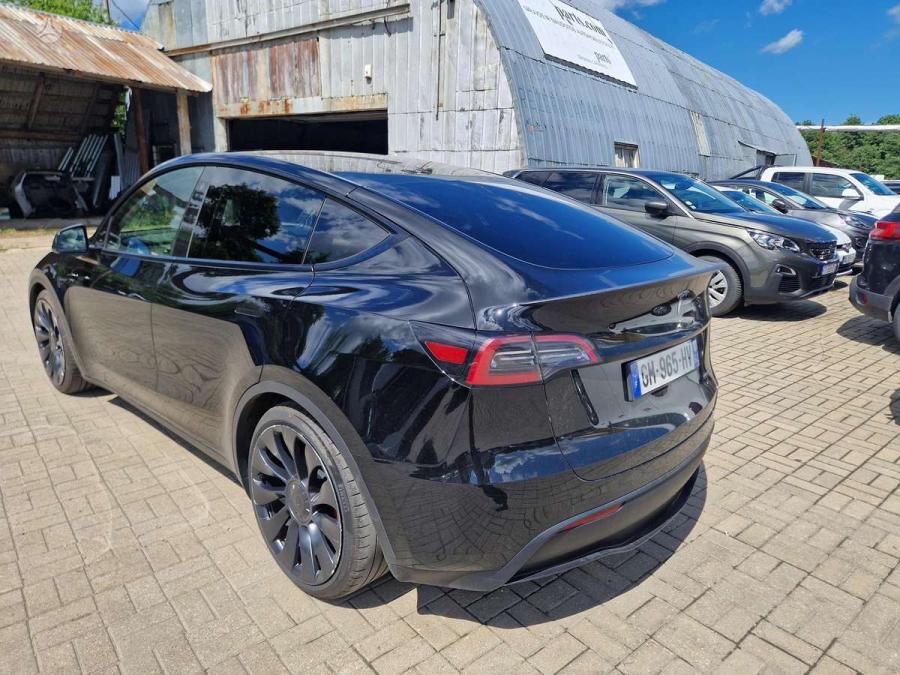 Black Tesla Model Y 2023 in Kaunas, with an engine capacity of 0.00 L and mileage of 305 thousand km for 21000 €, photo 7 on AUTOMOTO.COM.LV