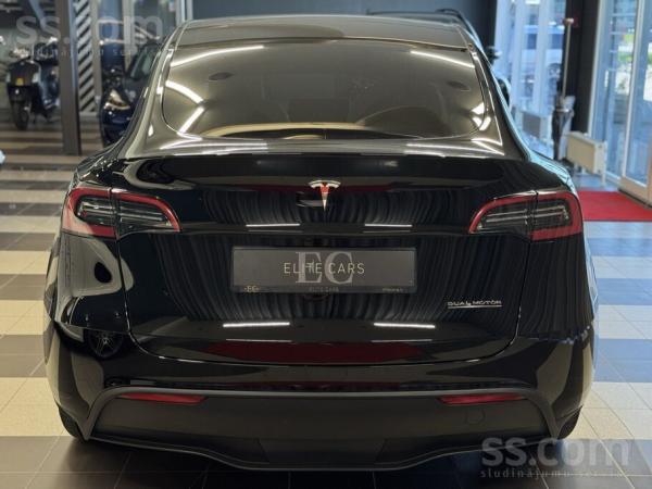 Black Tesla Model Y 2023 in Riga, with an engine capacity of 0.00 L and mileage of 60 thousand km for 35990 €, photo 5 on AUTOMOTO.COM.LV