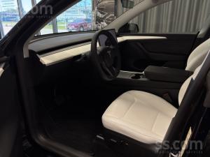 Black Tesla Model Y 2023 in Riga, with an engine capacity of 0.00 L and mileage of 60 thousand km for 35990 €, photo 8 on AUTOMOTO.COM.LV