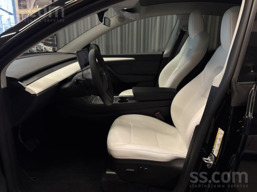 Black Tesla Model Y 2023 in Riga, with an engine capacity of 0.00 L and mileage of 60 thousand km for 35990 €, photo 9 on AUTOMOTO.COM.LV