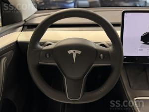 Black Tesla Model Y 2023 in Riga, with an engine capacity of 0.00 L and mileage of 60 thousand km for 35990 €, photo 15 on AUTOMOTO.COM.LV