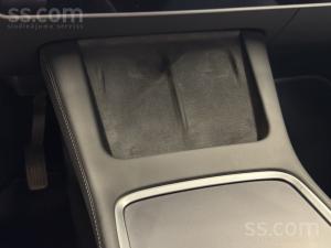 Black Tesla Model Y 2023 in Riga, with an engine capacity of 0.00 L and mileage of 60 thousand km for 35990 €, photo 22 on AUTOMOTO.COM.LV