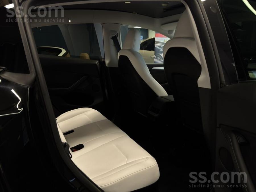 Black Tesla Model Y 2023 in Riga, with an engine capacity of 0.00 L and mileage of 60 thousand km for 35990 €, photo 26 on AUTOMOTO.COM.LV