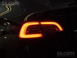 Black Tesla Model Y 2023 in Riga, with an engine capacity of 0.00 L and mileage of 60 thousand km for 35990 €, photo 29 on AUTOMOTO.COM.LV