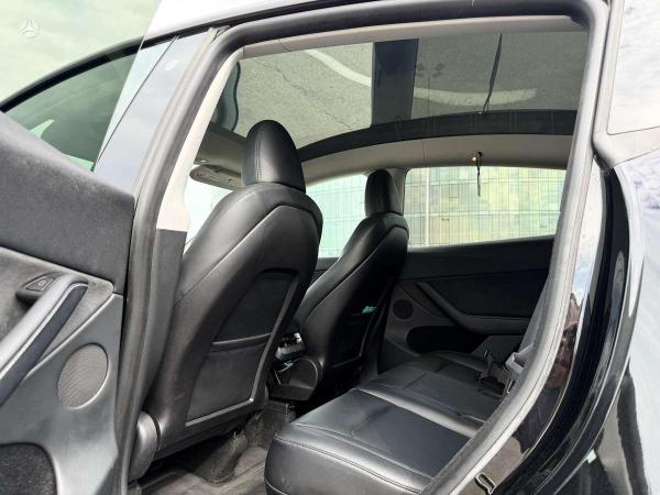 Black Tesla Model Y 2023 in Siauliai, with an engine capacity of 0.00 L and mileage of 46 thousand km for 30900 €, photo 7 on AUTOMOTO.COM.LV