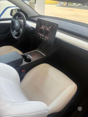 Melns Tesla Model Y 2023 Viļņa, ar dzinēja tilpumu 0.00 L un nobraukumu 72 tūkst. km par 32500 €, foto 12 vietnē AUTOMOTO.COM.LV