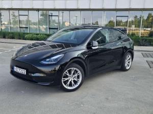 Black Tesla Model Y 2023 in Vilnius, with an engine capacity of 0.00 L and mileage of 60 thousand km for 25860 €, photo  on AUTOMOTO.COM.LV